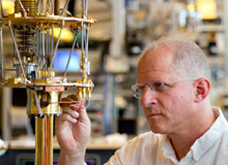 Quantum communication controlled by resonance in “artificial atoms ...