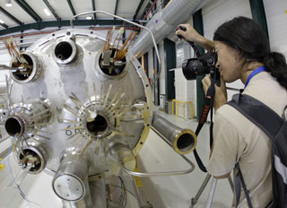 Physicists unveil results helping explain universe - Research ...