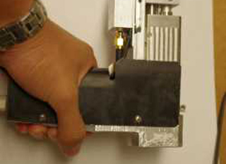 New handheld device uses lasers, sound for melanoma imaging - Research ...
